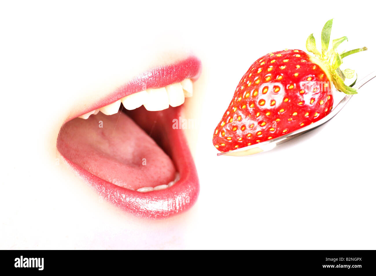 Teenager eating fruit teeth Cut Out Stock Images & Pictures - Alamy