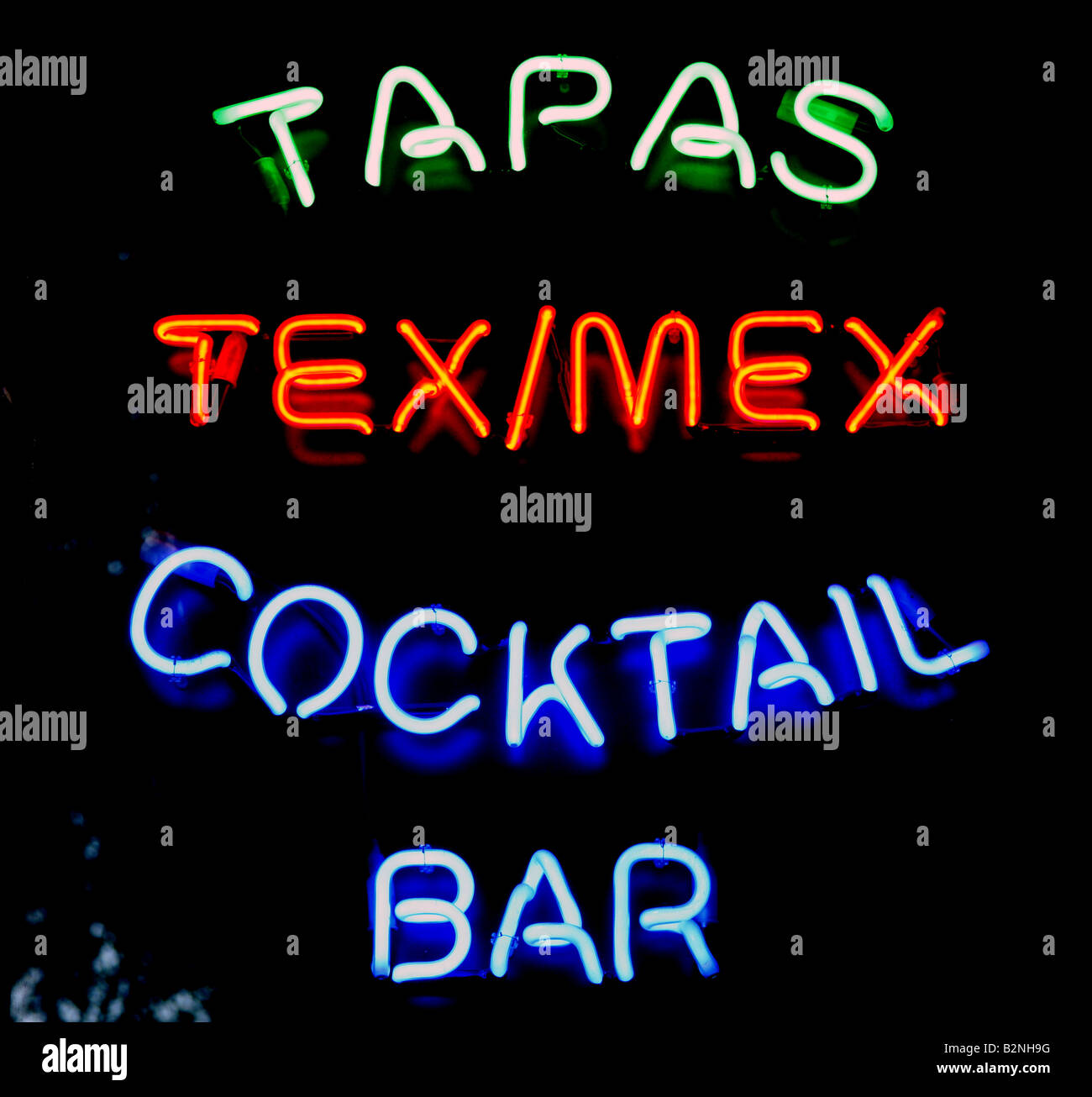 Neon sign in window of Tex-Mex restaurant, London Stock Photo - Alamy