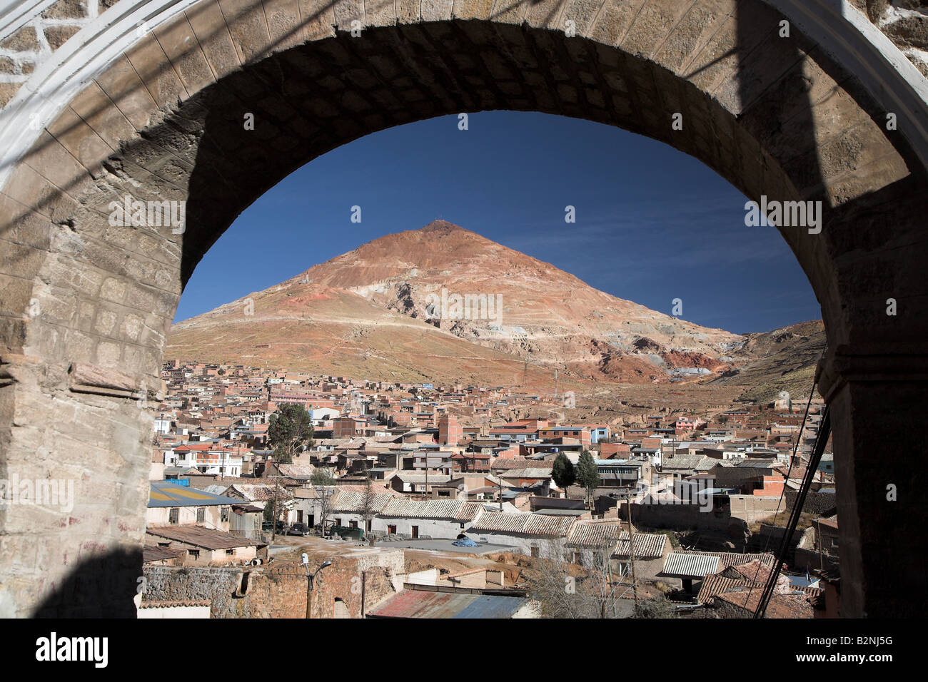 View through an arch of the silver mining hill Cerro Rico which ...