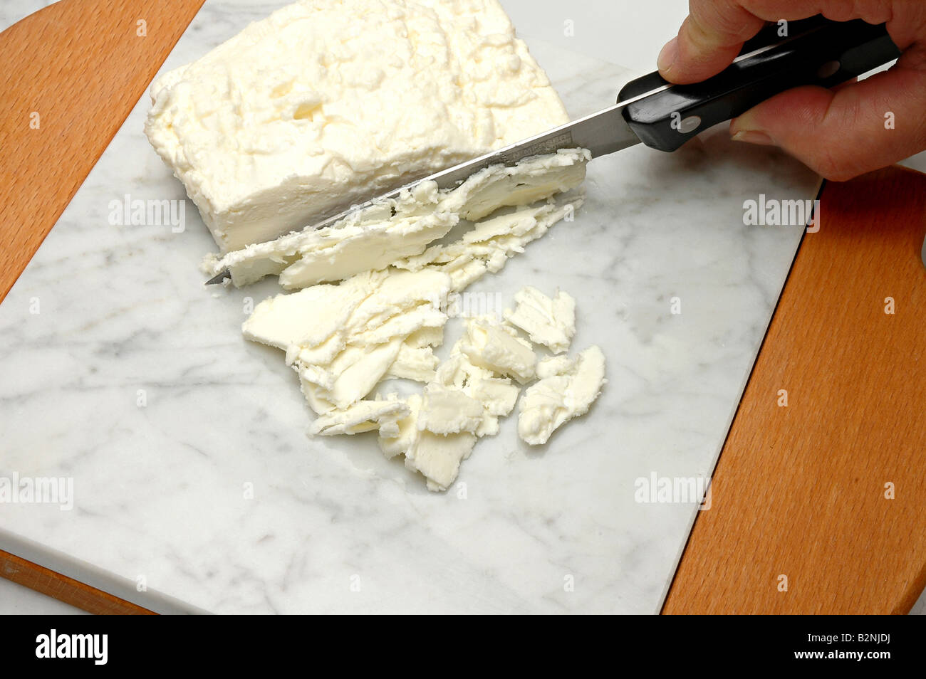 Cutting Feta cheese, Wafer of Grana cheese with onions, (Step.5), Italy ...