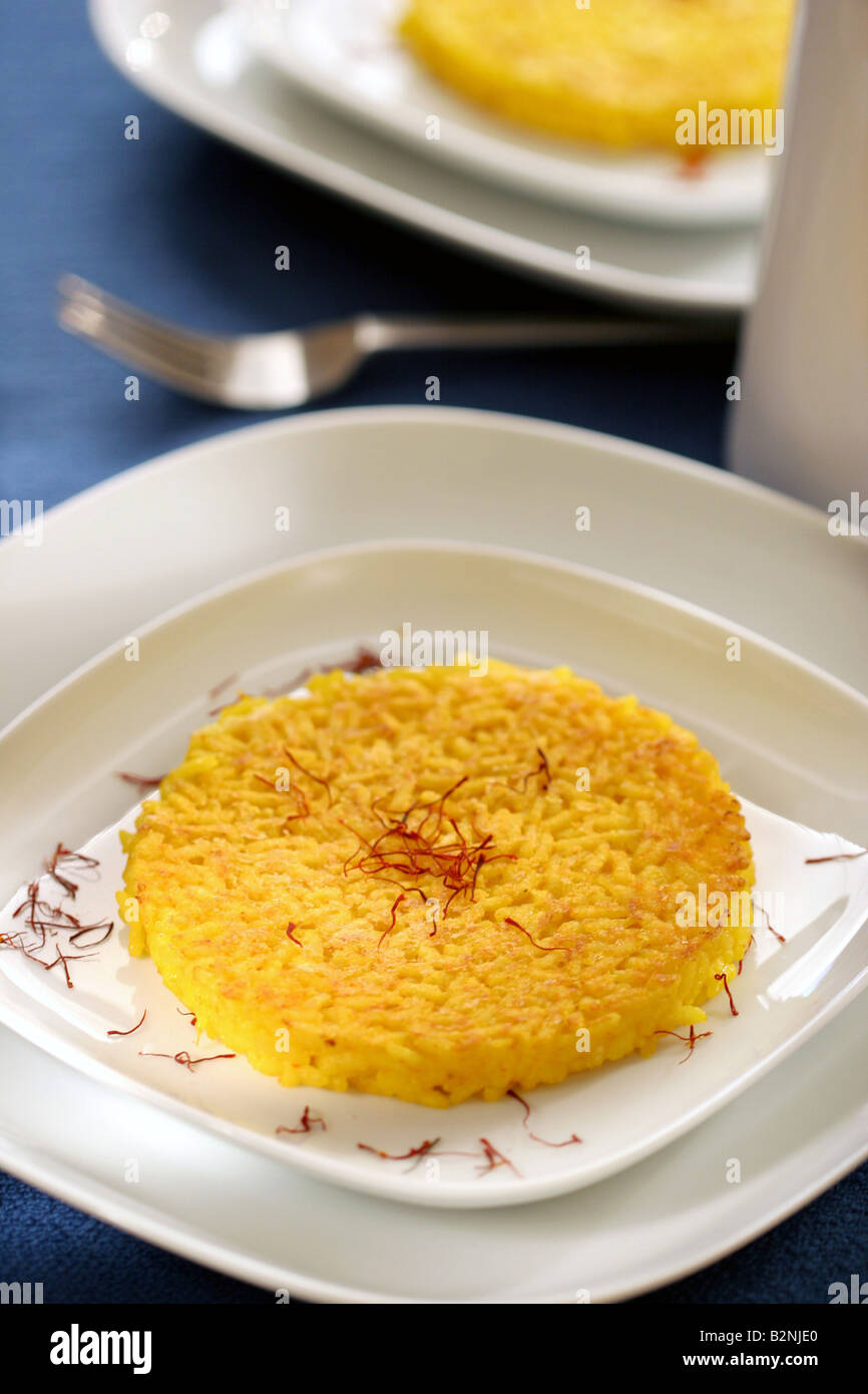 Roasted rice with saffron, Italy Stock Photo - Alamy