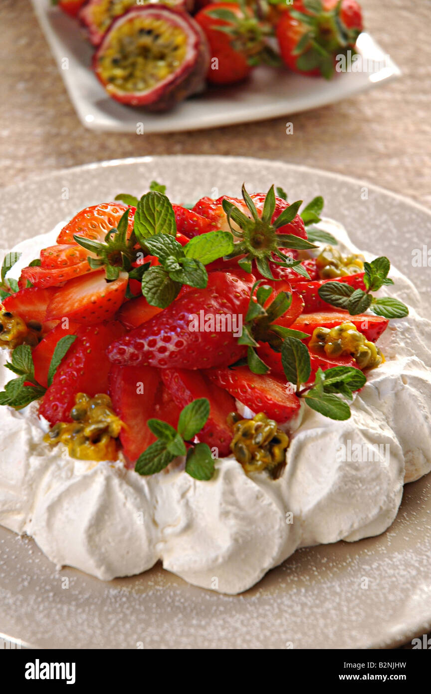 Pavlova meringue cake with cream and fruits, Italy Stock Photo - Alamy