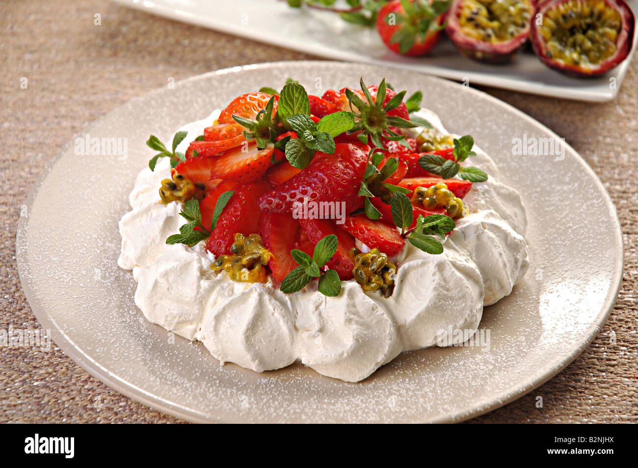 Pavlova meringue cake with cream and fruits, Italy Stock Photo - Alamy