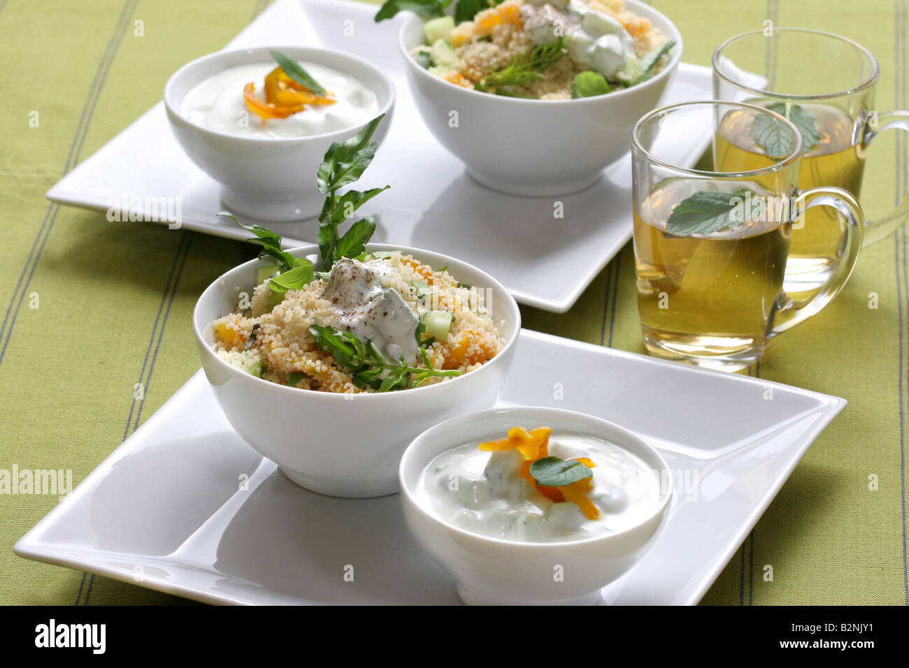 Cress salad with couscous, mint, yoghurt and lime, Italy Stock Photo ...