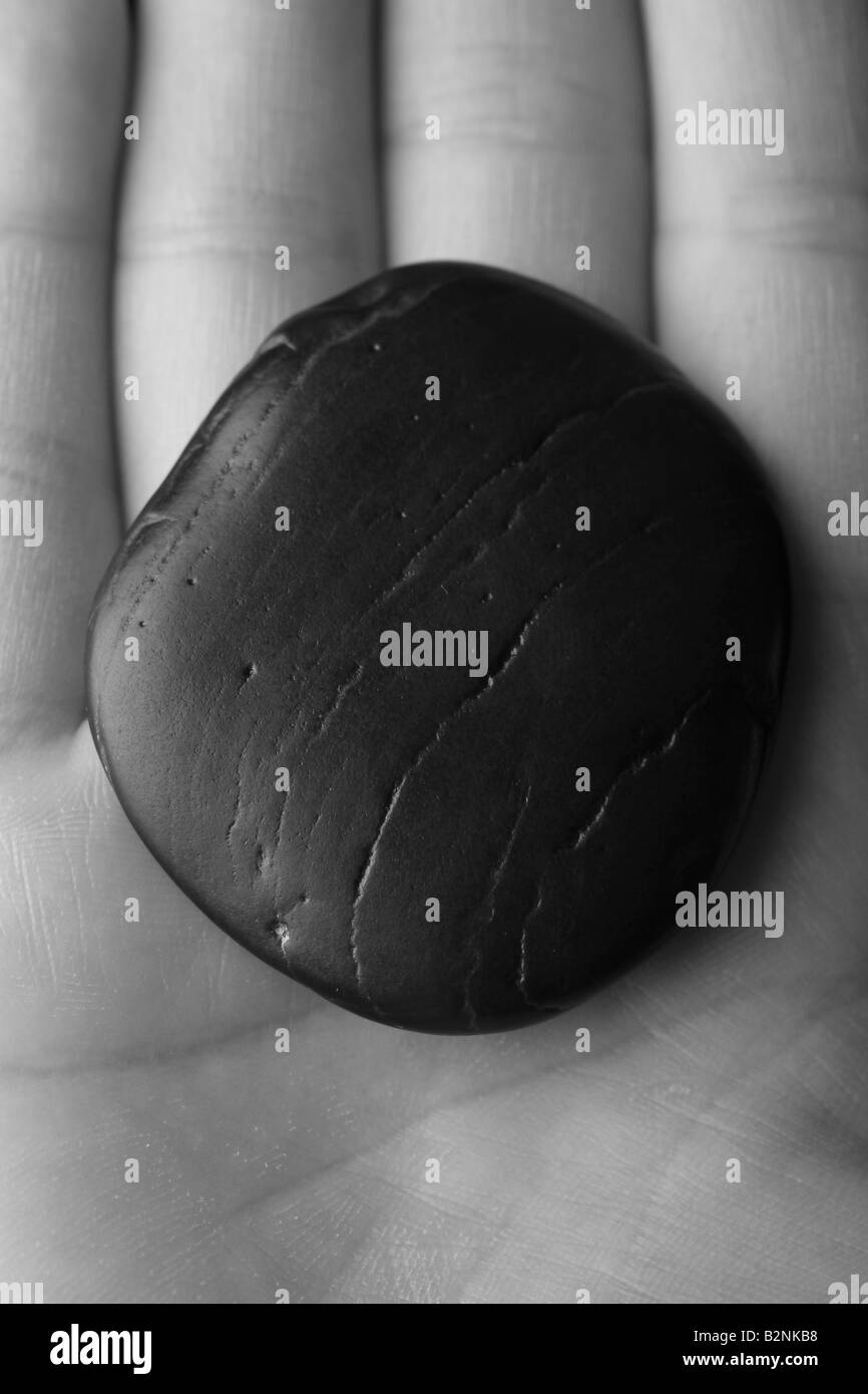 Hand stone zen hi-res stock photography and images - Alamy