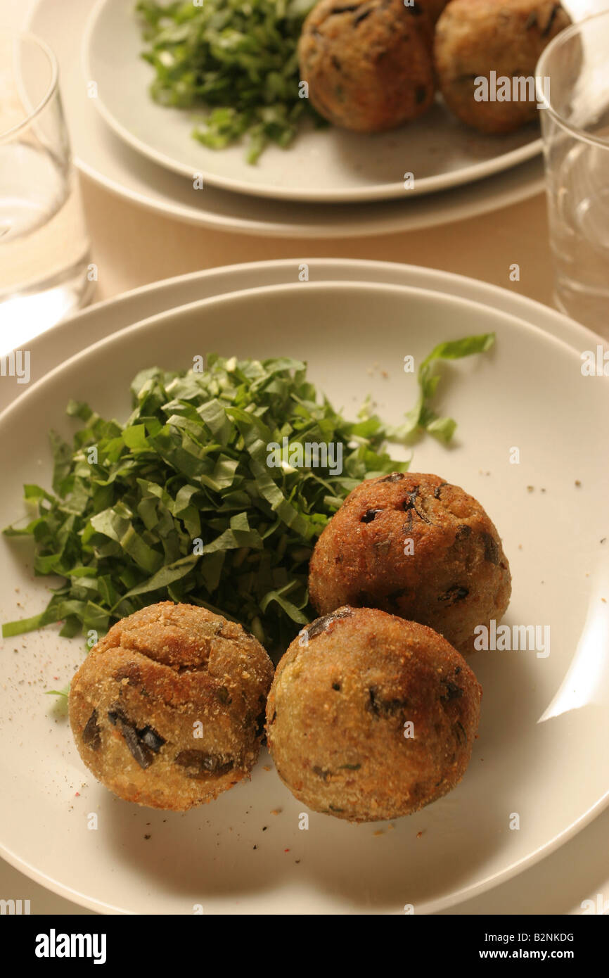 Aubergine rissoles with cicorino salad, Italy Stock Photo - Alamy