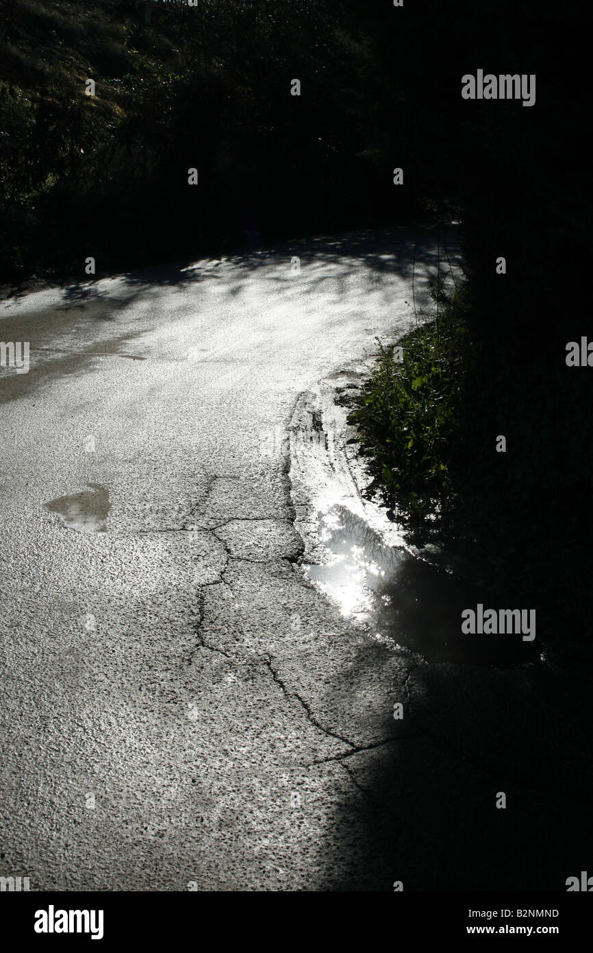 Dark road pot holes hi-res stock photography and images - Alamy