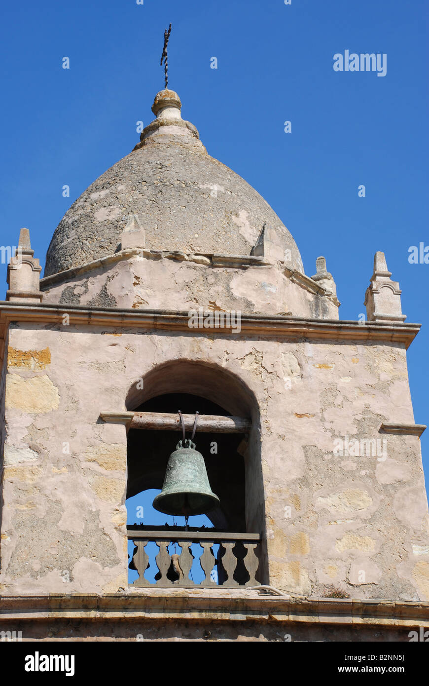 Architecture detail of the bell tower showing one of the nine bells in ...