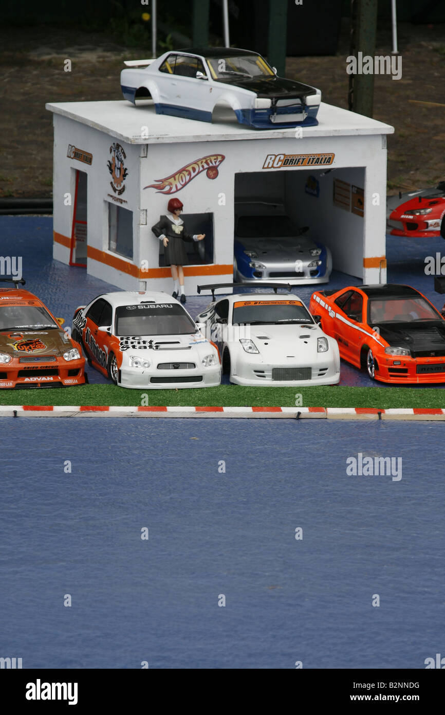 miniature toy rally cars by race track Stock Photo - Alamy
