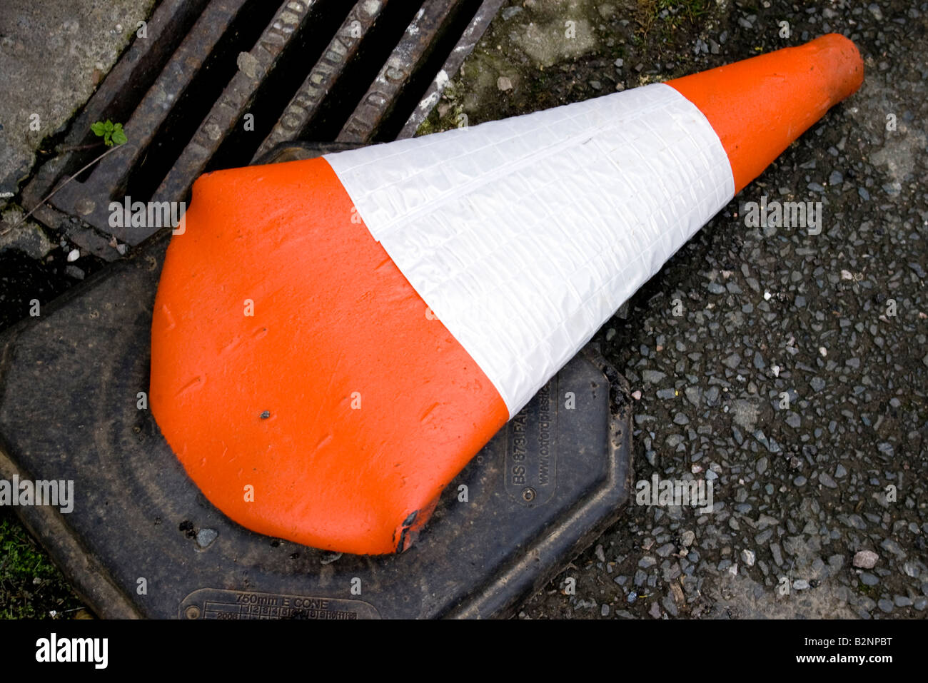 Flattened traffic cone Stock Photo - Alamy