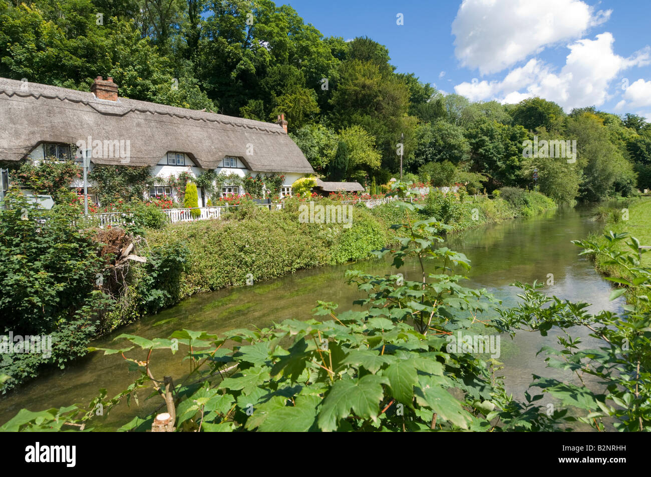 Cottage River Test Wherwell Hampshire UK Stock Photo - Alamy