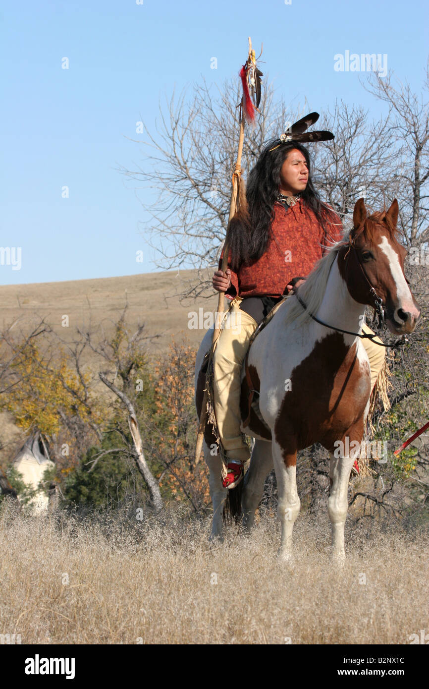 A Native American Sioux Indian on Horseback standing guard above the ...