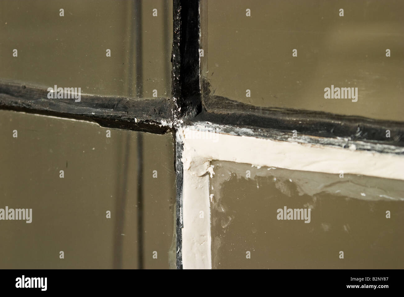 Close up of an office window that recently has had grout added to it ...