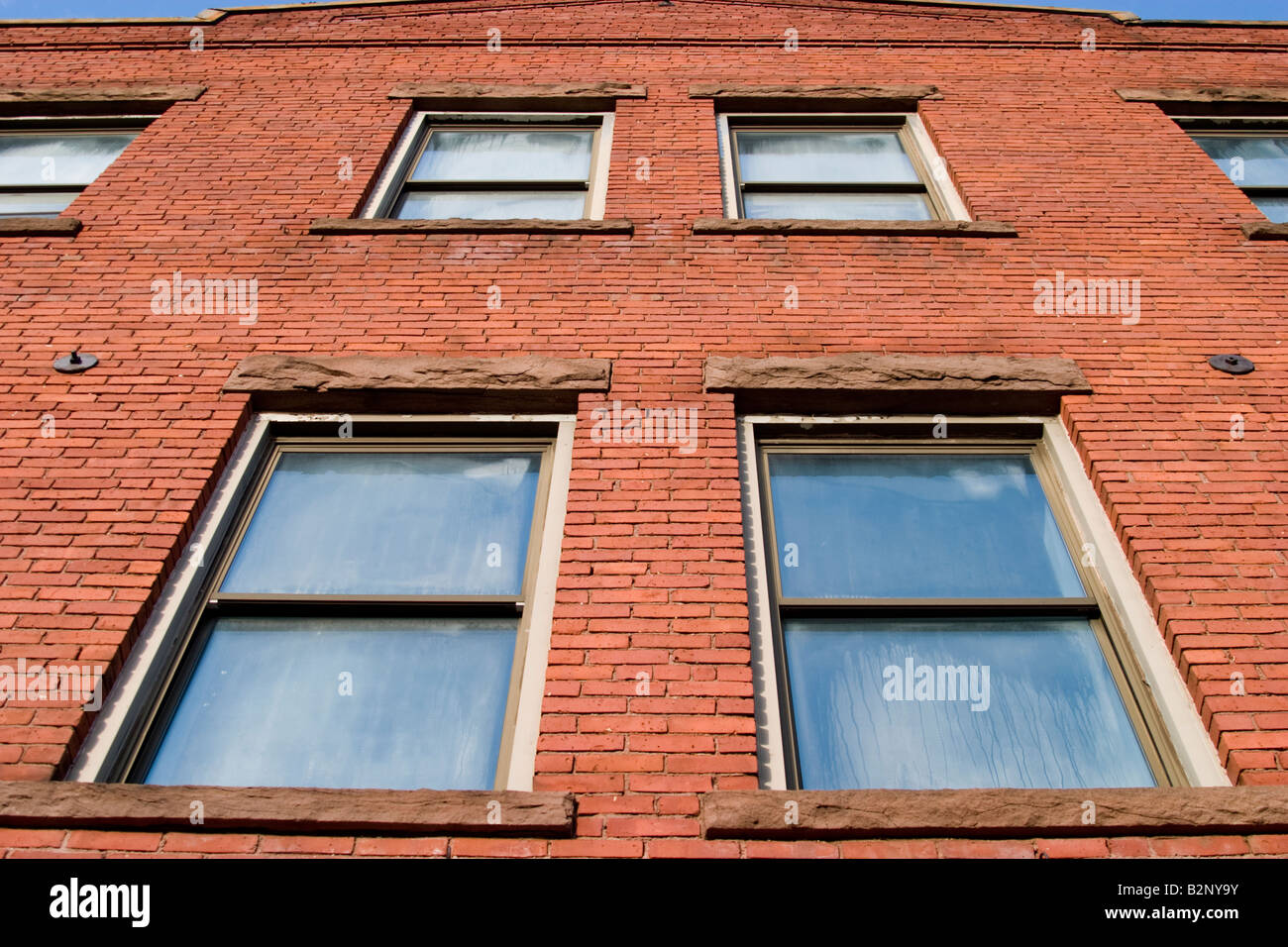 Exterior wall of a brick office building Stock Photo - Alamy