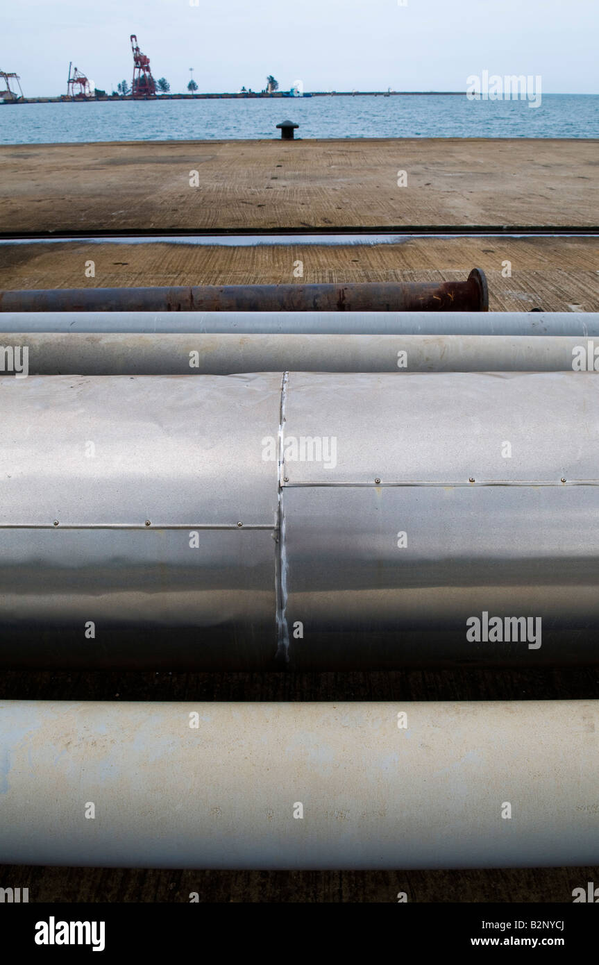 Oil refinery pipes at the loading docks Stock Photo - Alamy