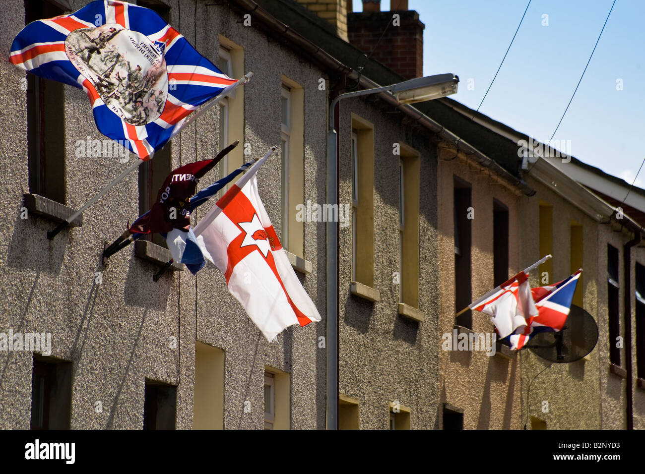 Unionist flags fly from windows of terraced houses in the Waterside ...