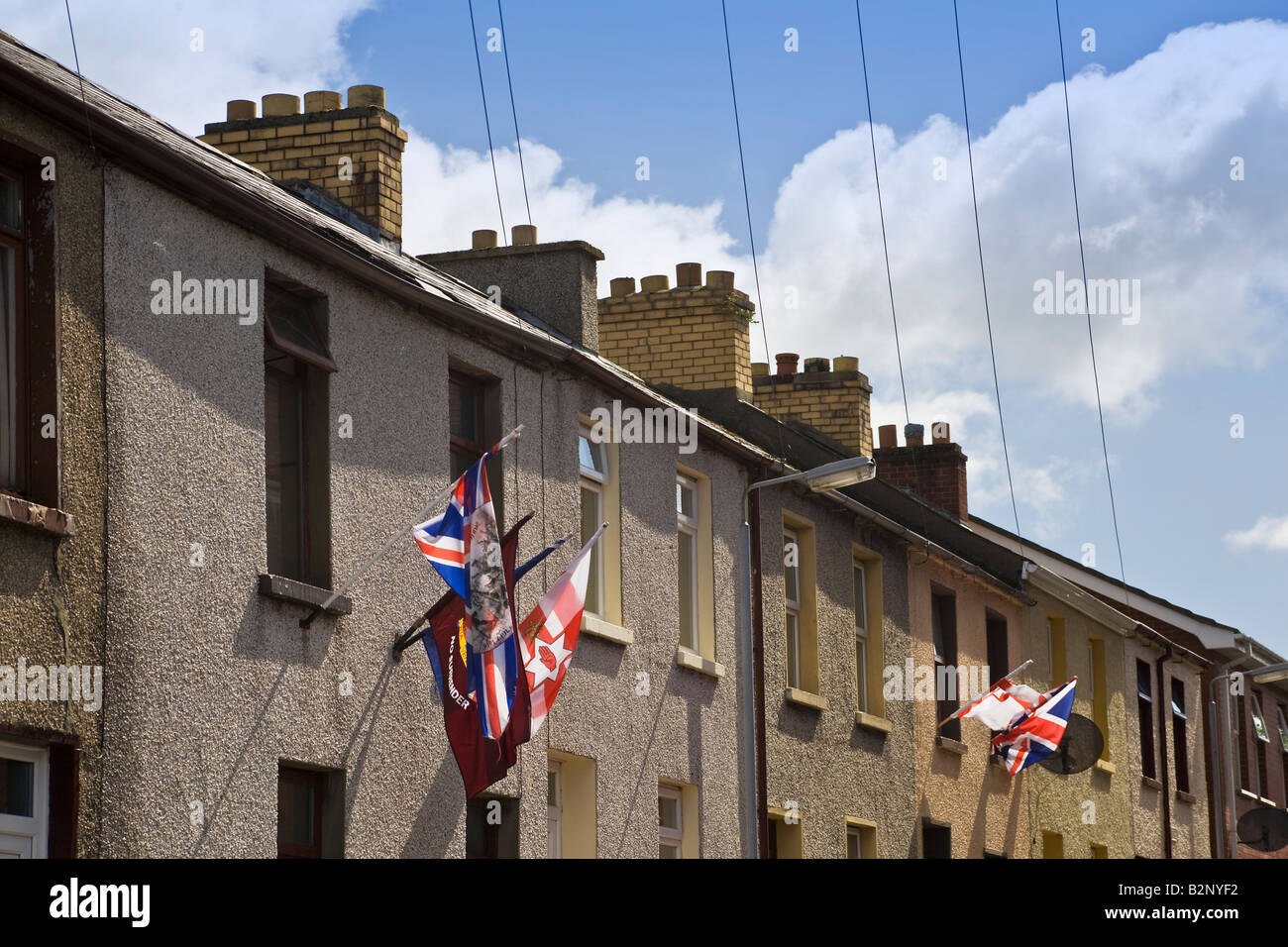 Unionist flags fly from windows of terraced houses in the Waterside ...