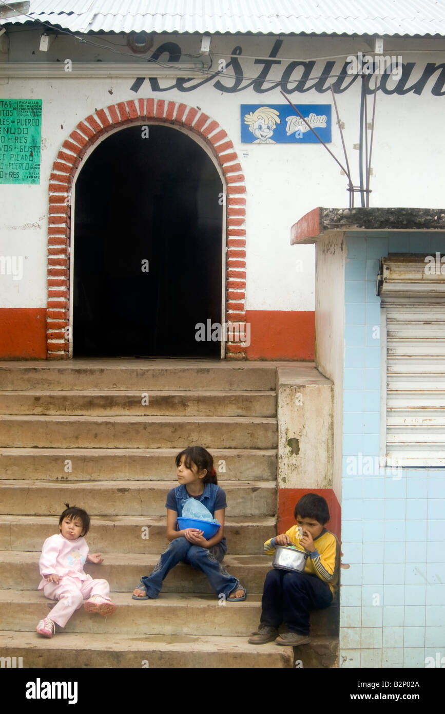 Mexican children at bus stop Stock Photo - Alamy