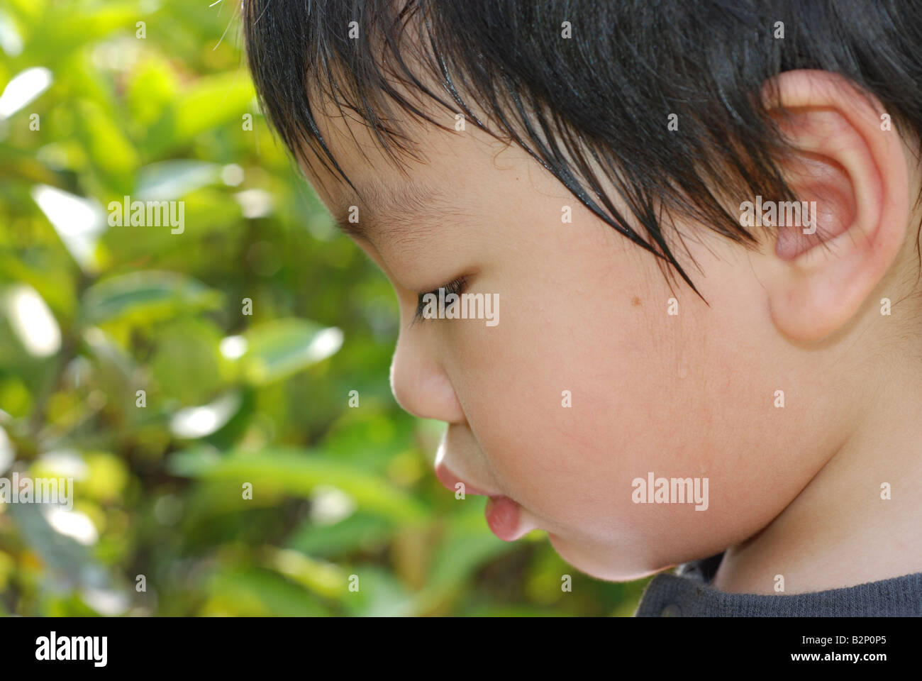 Chinese boy profile hi-res stock photography and images - Alamy