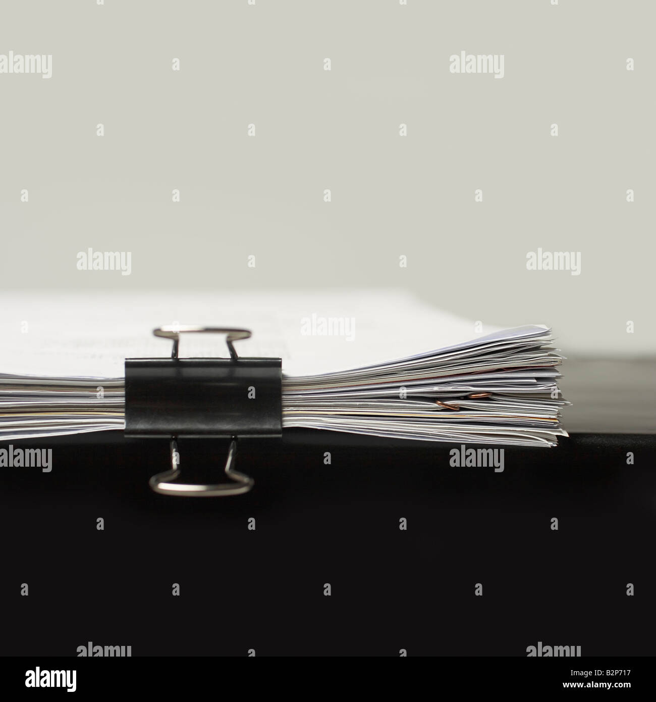 Stack of paperwork clipped together Stock Photo - Alamy