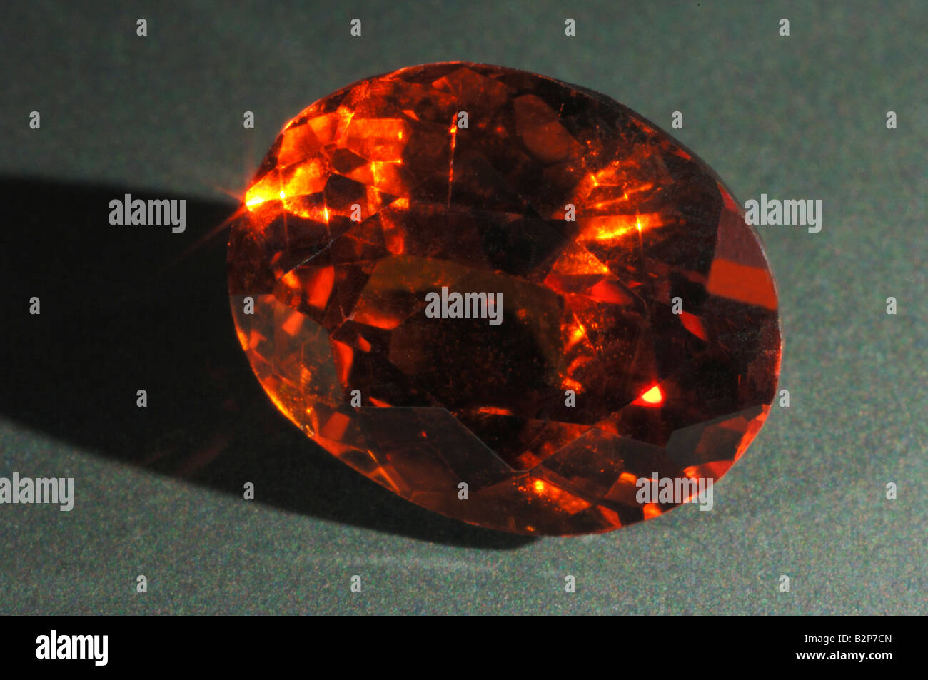 Cut red garnet, studio picture Stock Photo - Alamy