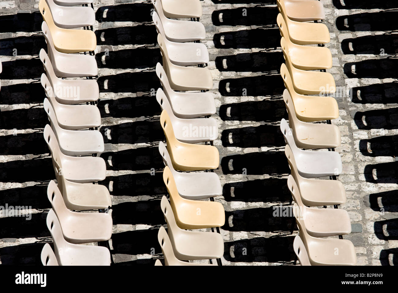 Rows of empty plastic chairs Stock Photo - Alamy