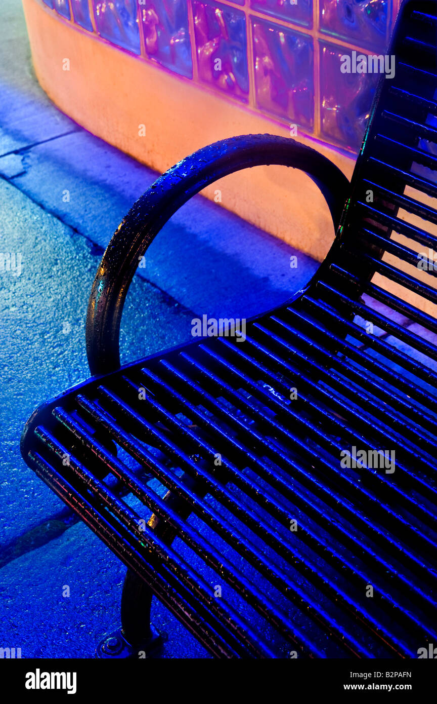 Metal Outdoor Bench Lit With Bright Neon Colorful Lights At Night In ...