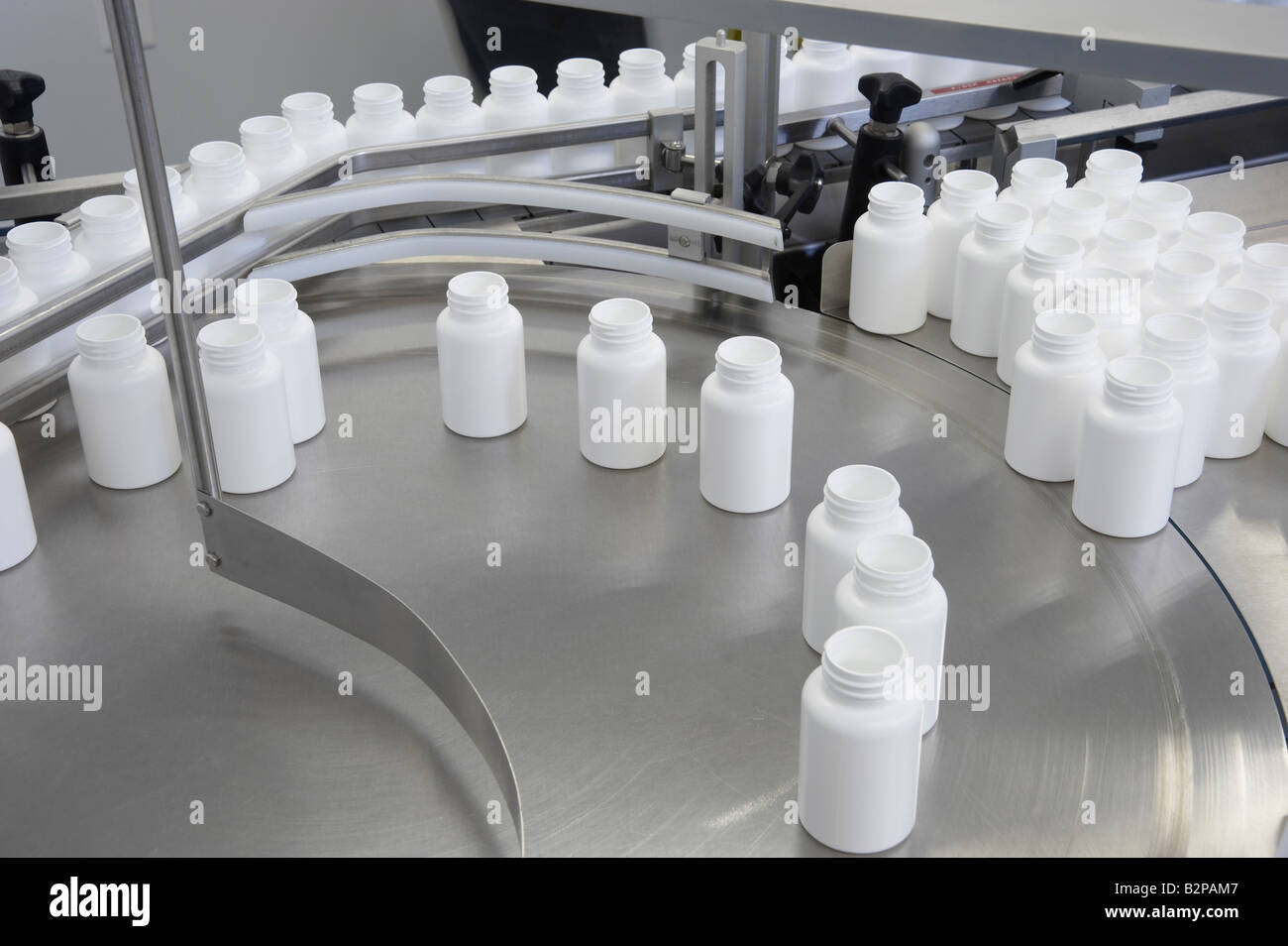 Medicine bottles production line hi-res stock photography and images ...