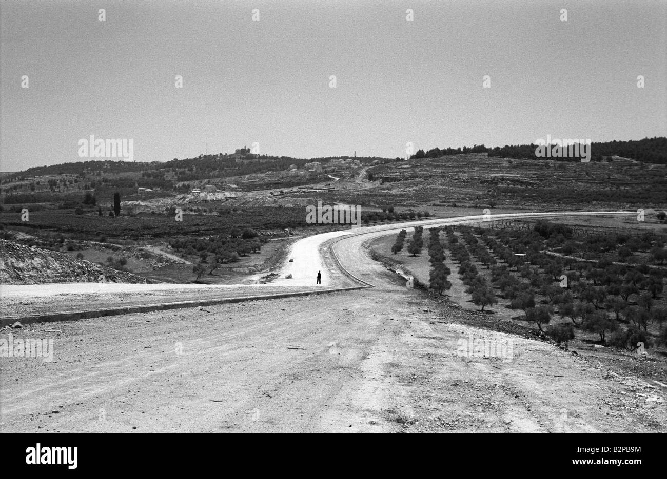 a lands cape picture of the path of the israeli separation barrier or ...
