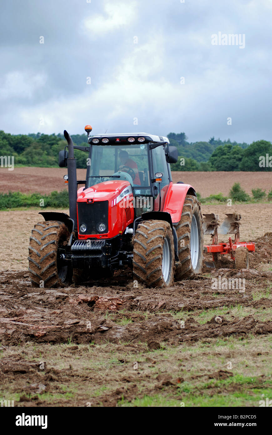 Massey Ferguson 6490 tractor ploughing field Worcestershire England UK ...
