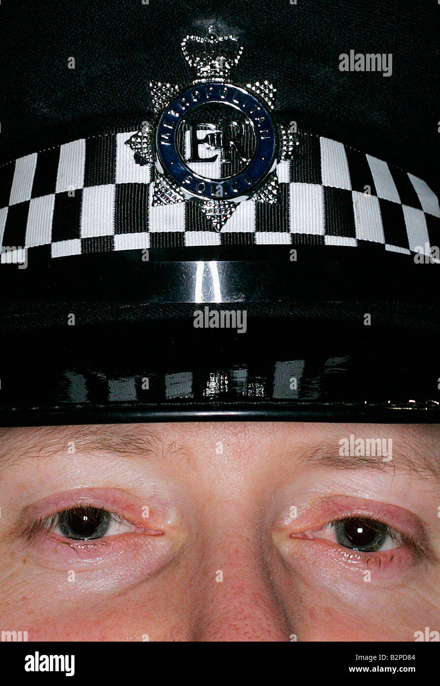 A metropolitan (London) police officer and his helmet Stock Photo - Alamy