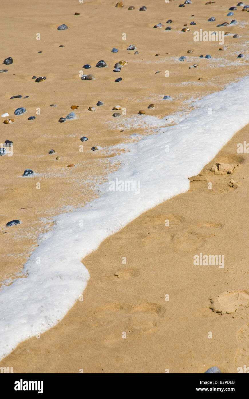 Foam on Sand Stock Photo - Alamy