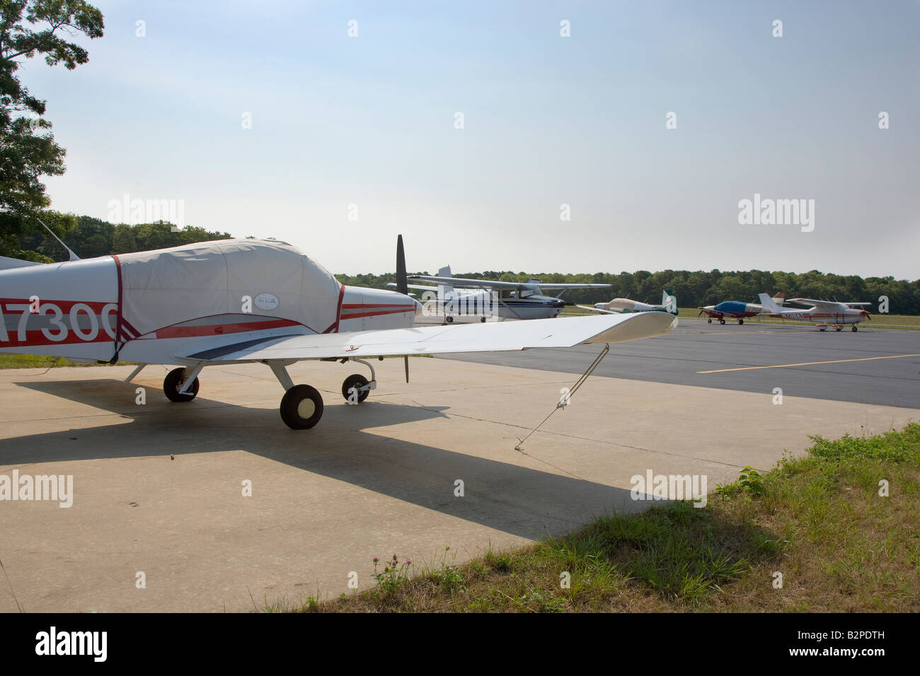 Planes at a small airport Stock Photo - Alamy