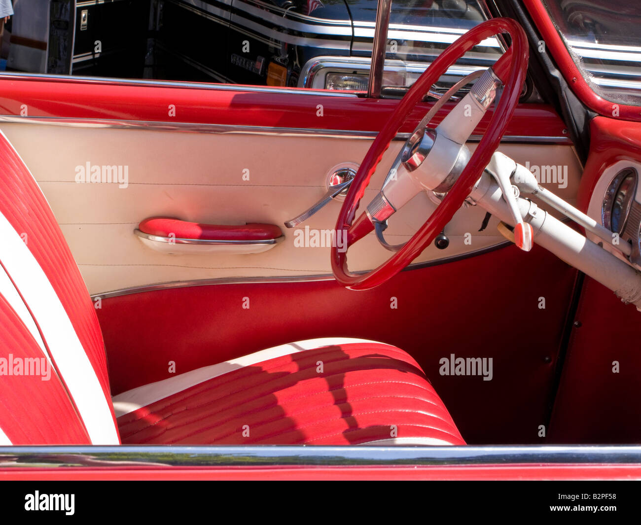 Seat and Dashboard of an old American red Chevrolet Stock Photo - Alamy