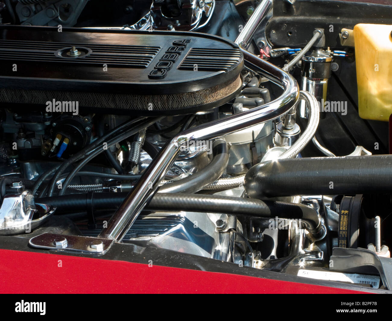 Old American car engine (possibly a Cobra Stock Photo - Alamy