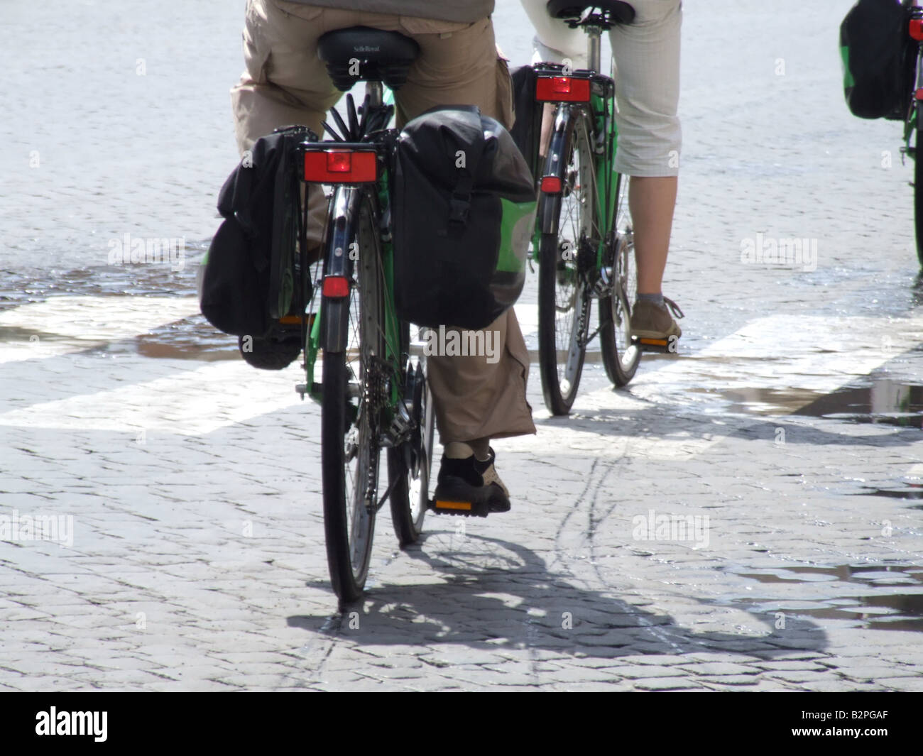 people touring on bikes in street road Stock Photo - Alamy
