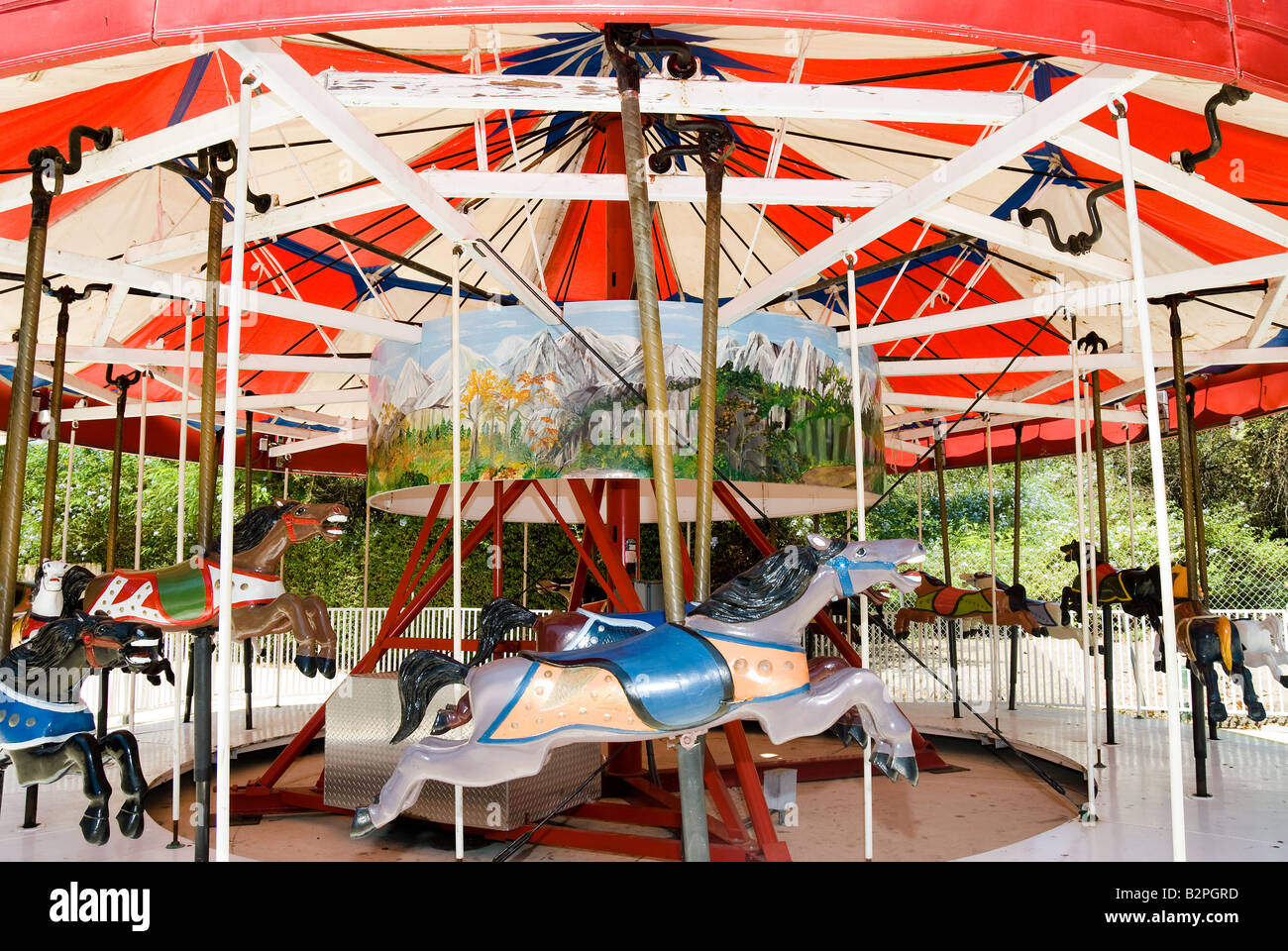 A merry go round ride at a county fair Stock Photo - Alamy