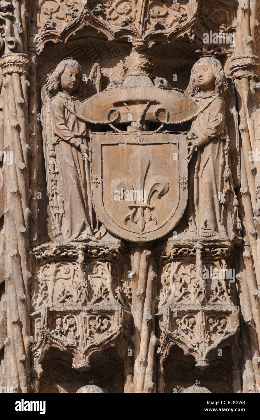 Detail showing two angels holding a stone carving shield with a fleur ...