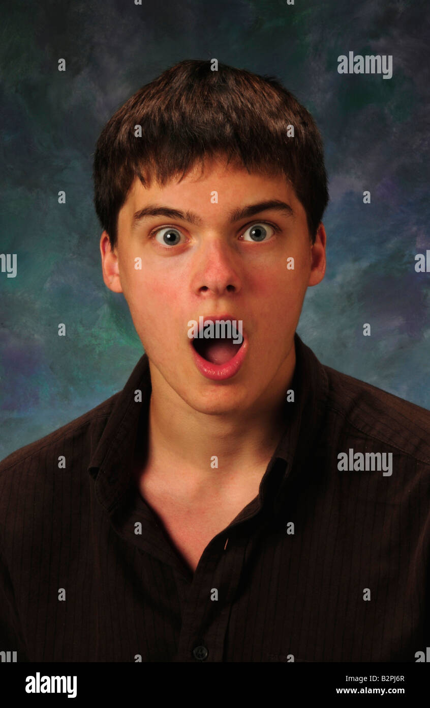 Surprised facial expression of a shocked teenager Stock Photo - Alamy
