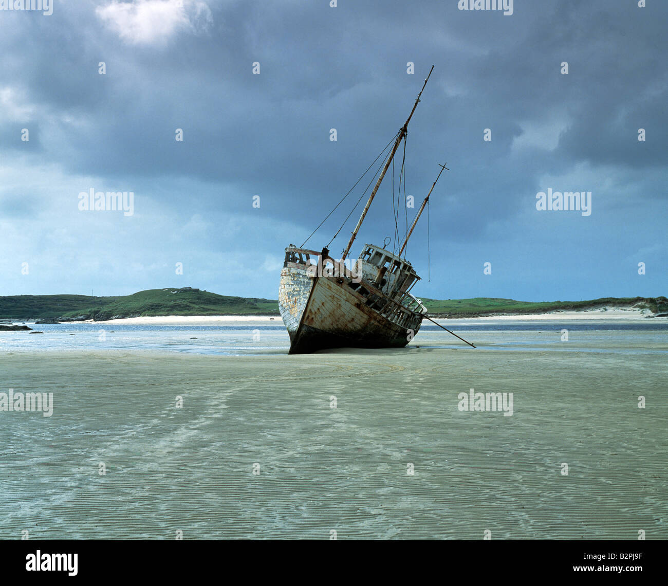 old fishing ship/trawler lying on a sandy beach Stock Photo - Alamy