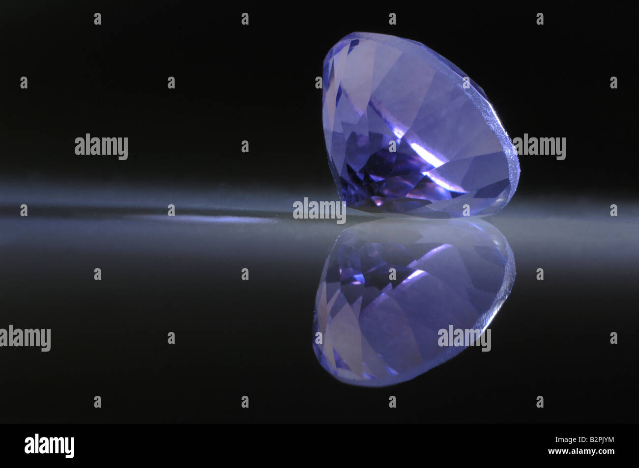 Cut Amethyst, studio picture Stock Photo - Alamy