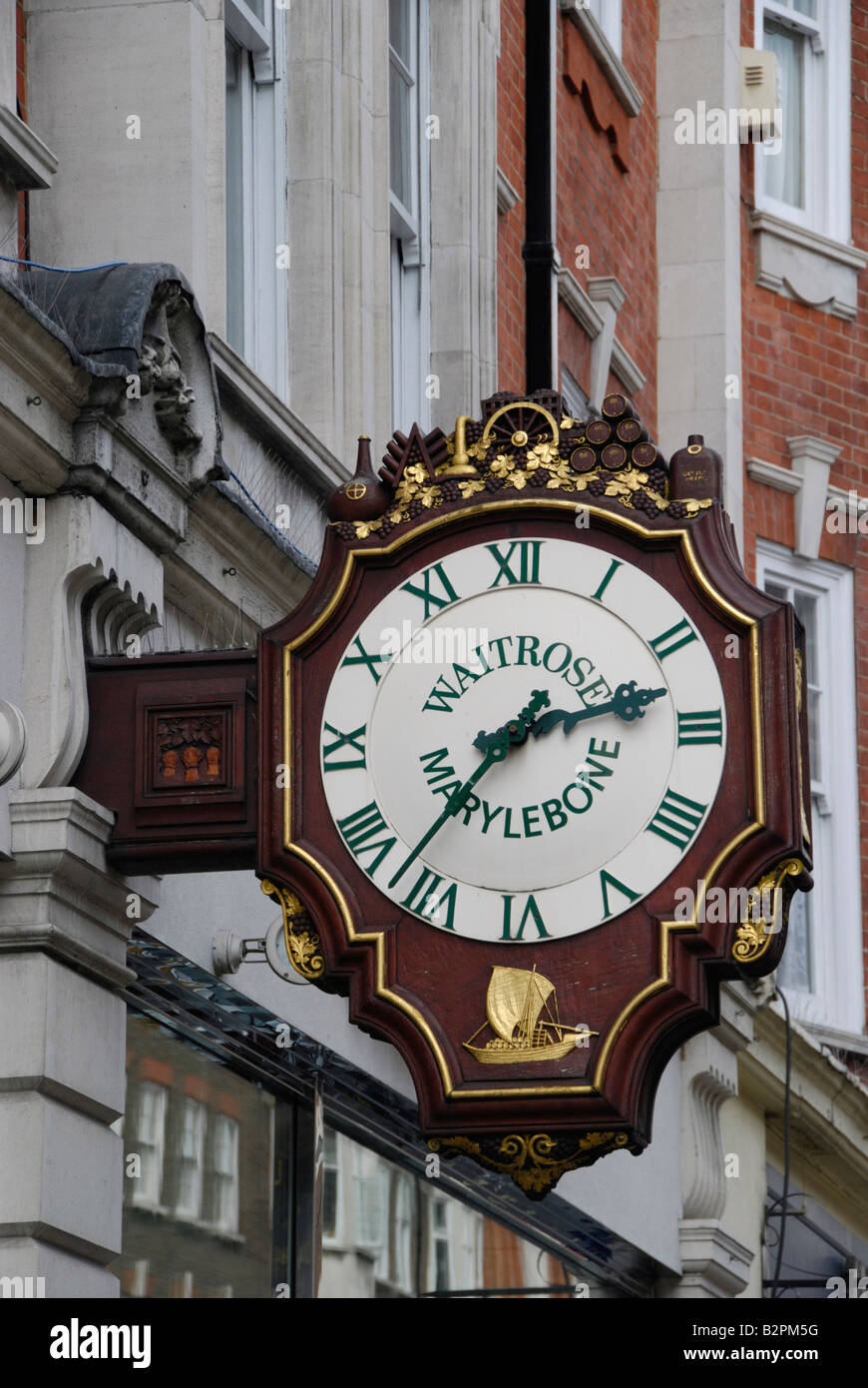 Old Victorian clock above Waitrose supermarket in Marylebone High ...