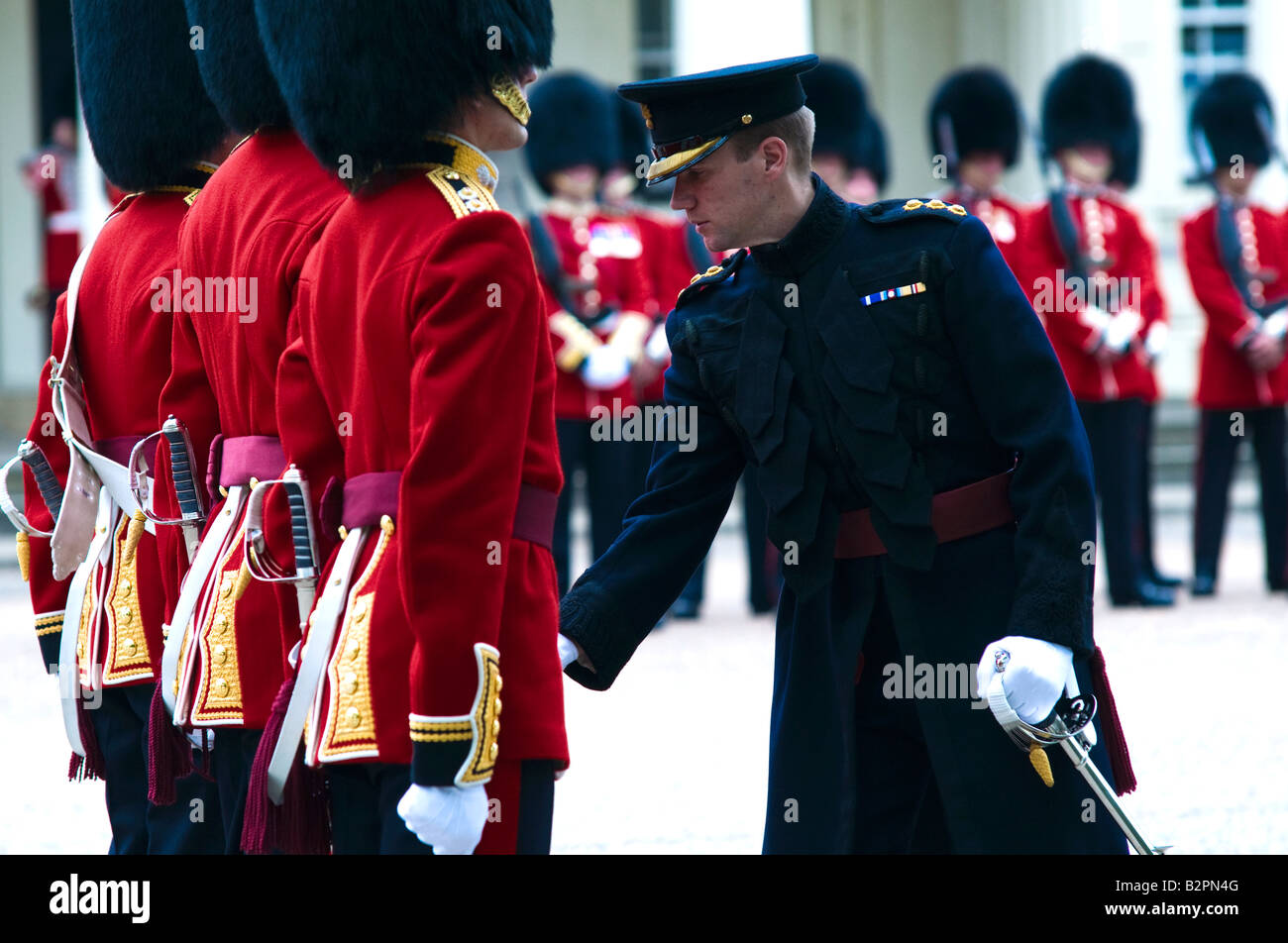 The queen's guard stand in line during a parade in london Stock Photo ...