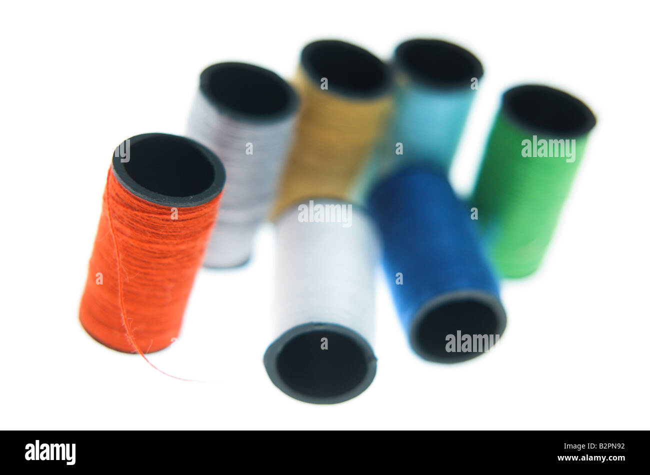 different colored thread for sowing Stock Photo - Alamy