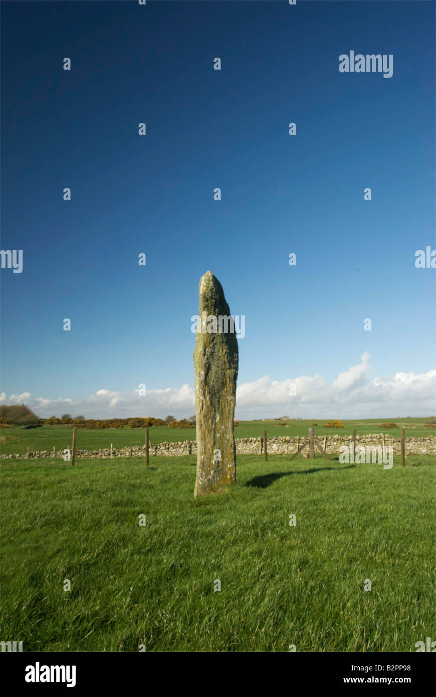 An alignment of three prehistoric standing stones, one of which has ...