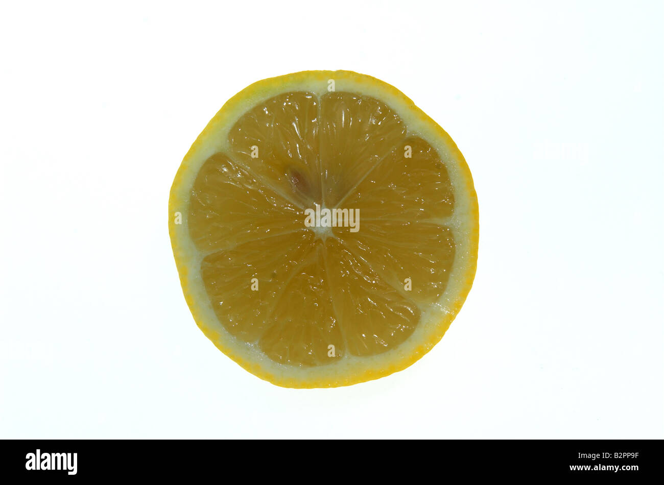 Half segment of a lemon Stock Photo - Alamy
