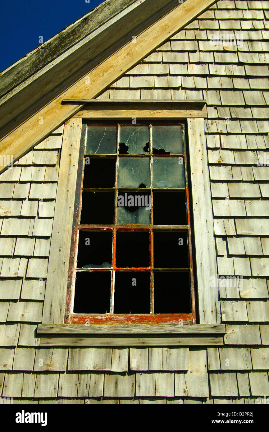 A broken window in an old fishing shed Stock Photo - Alamy