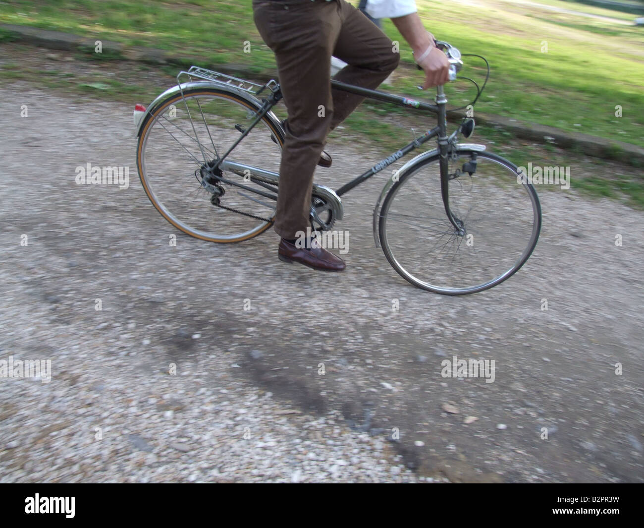 one person riding bike in park Stock Photo - Alamy