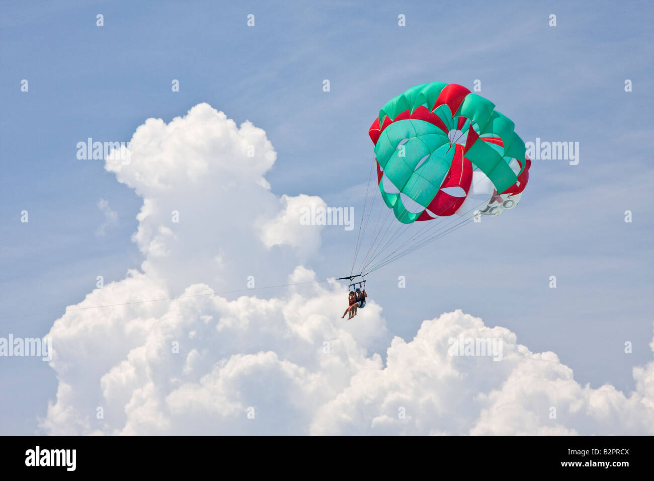 A couple parasails above the Caribbean sea off the coast of Riviera ...