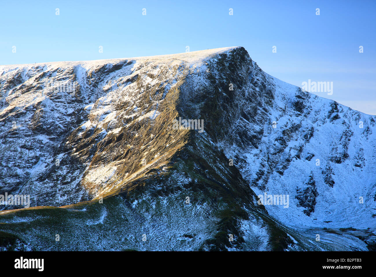 Sharp Edge Ridge covered in snow and ice. Blencathra, Lake District ...